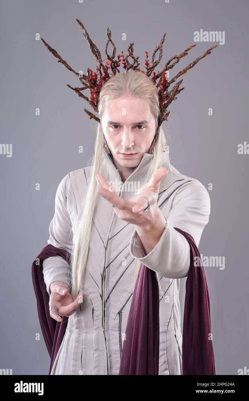 Models dressed in Wizard and troll Stock Photo - Alamy