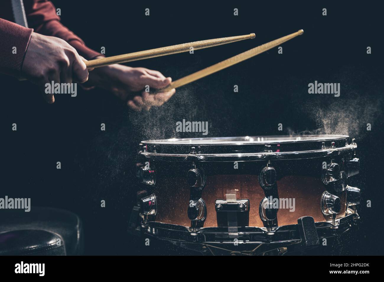 The drummer's hands hold drumsticks and play the snare drum Stock Photo ...