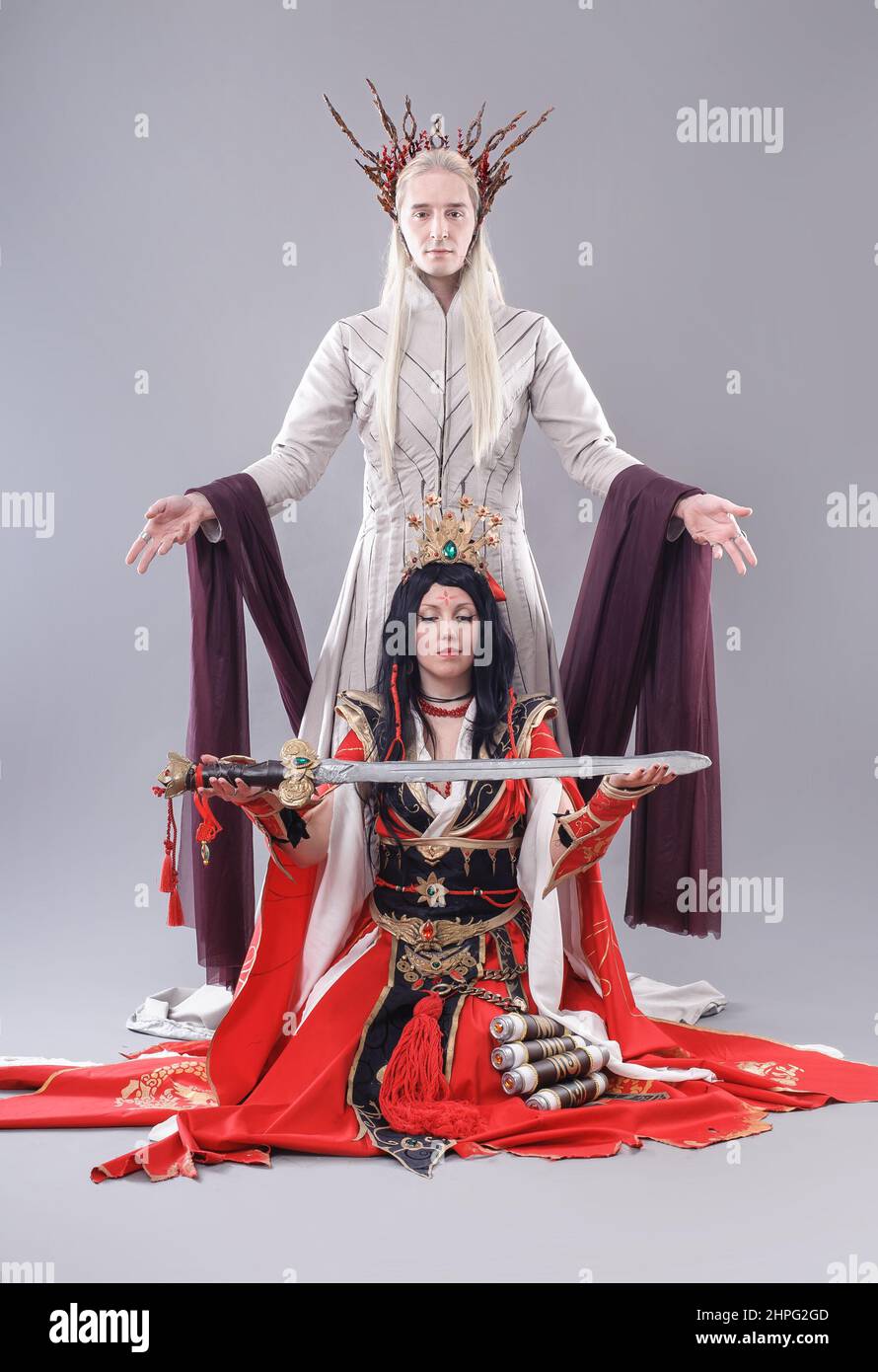 Models dressed in Wizard and troll Stock Photo - Alamy