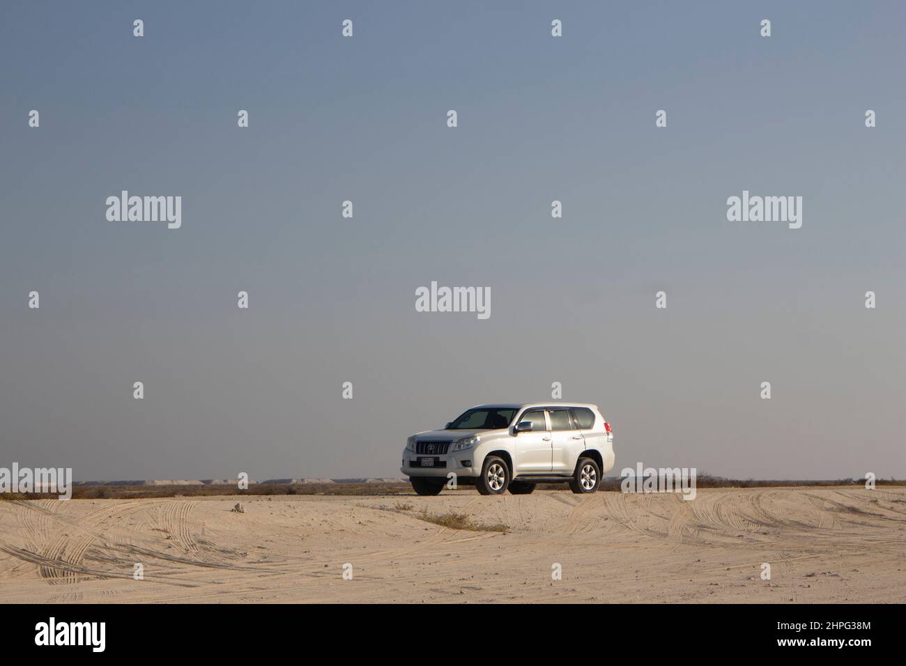 Car driving on the Desert Stock Photo - Alamy