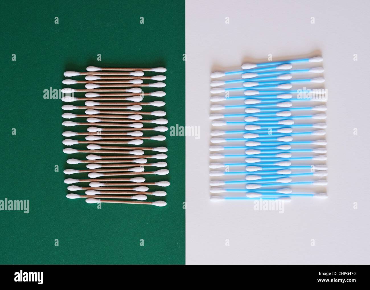 A comparison of eco-friendly and plastic cotton buds flat lay Stock ...