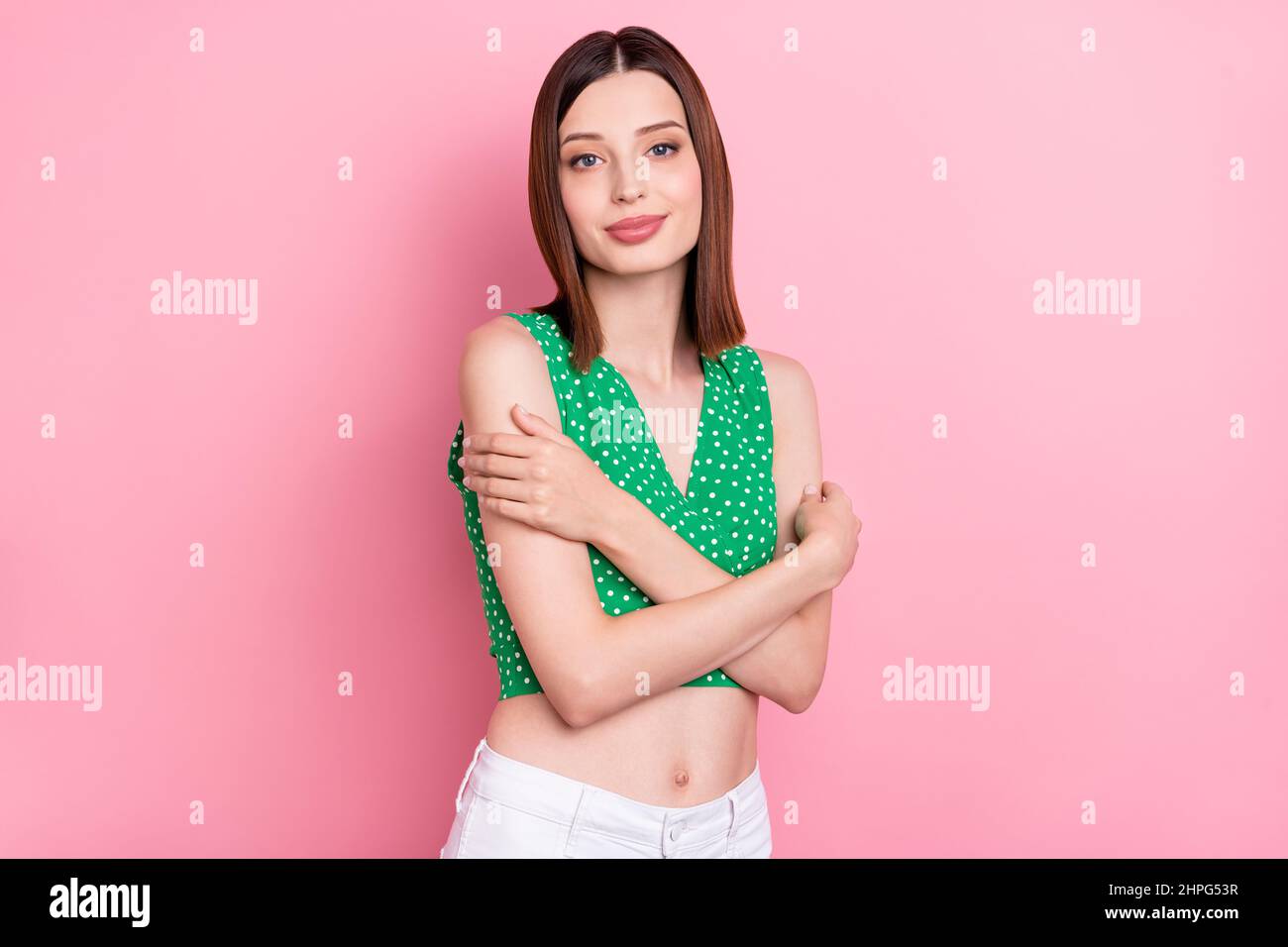 Photo of young charming lady hug herself dream enjoy bodycare soft ...