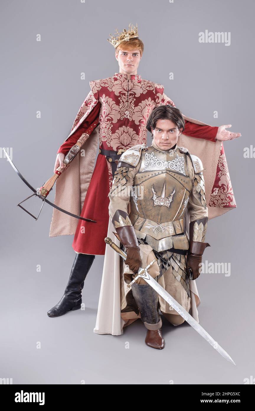 Medieval king with sword and crown Stock Photo - Alamy