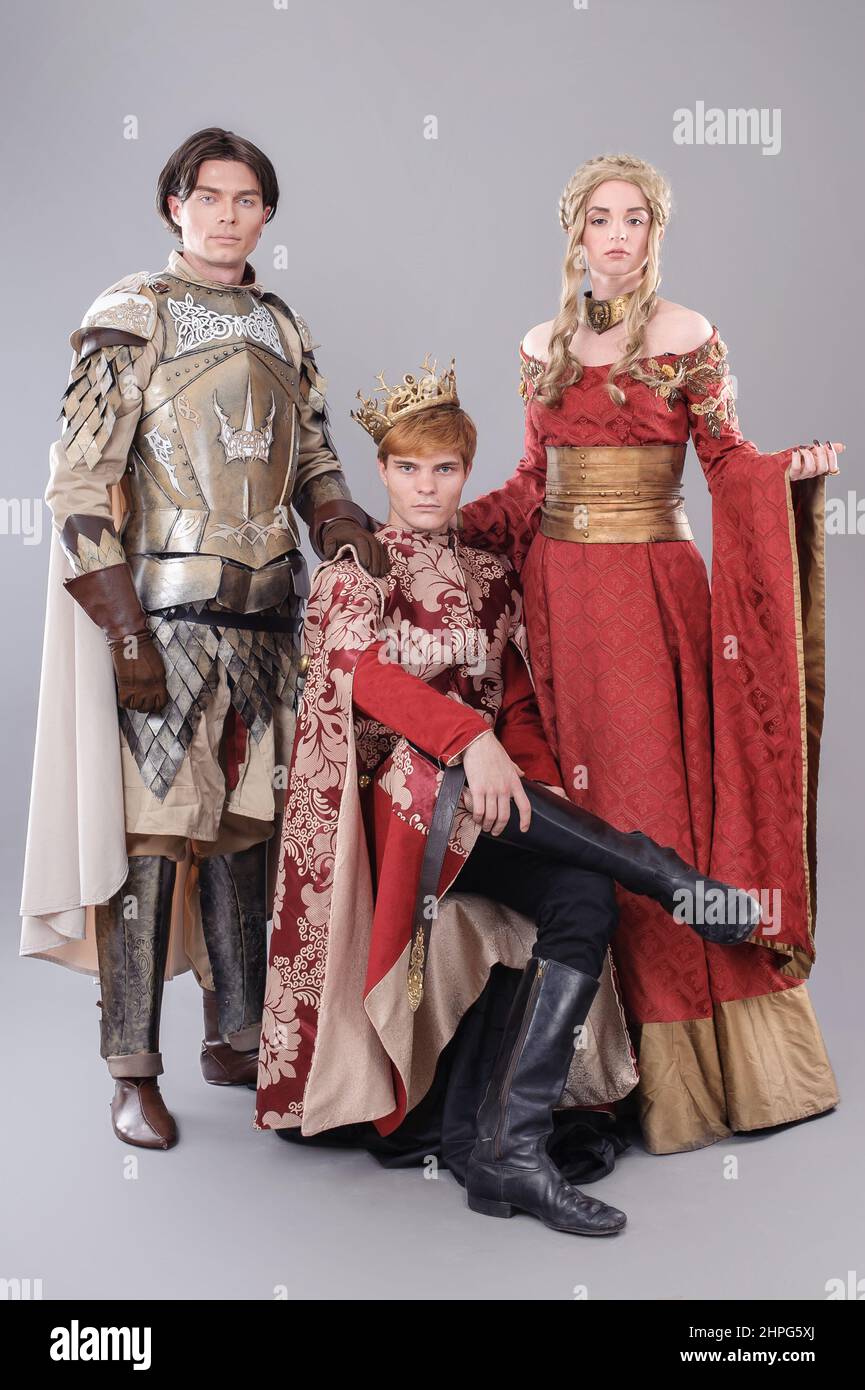 Medieval king with sword and crown Stock Photo - Alamy