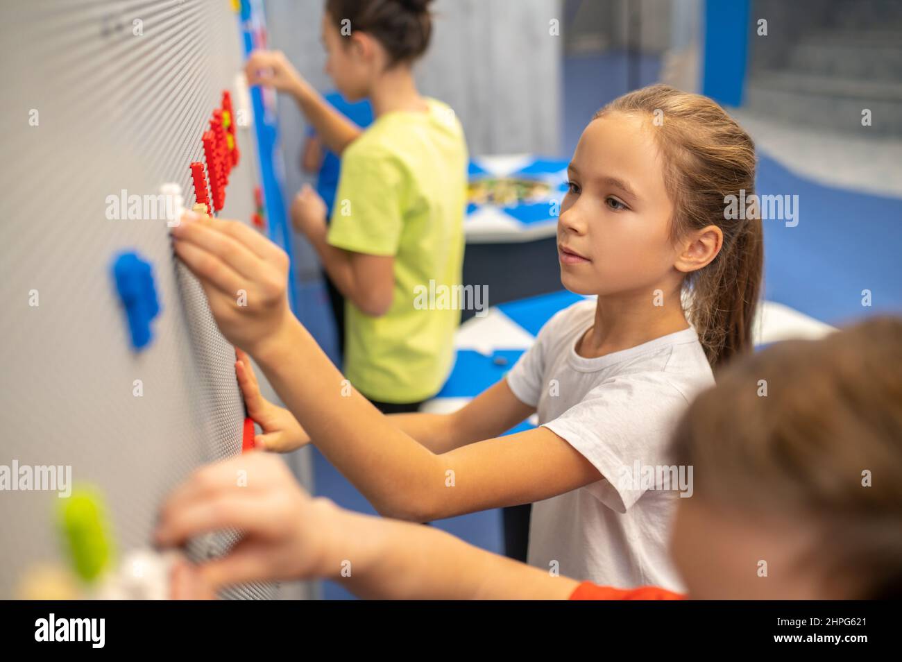 Girl with lego hi-res stock photography and images - Alamy