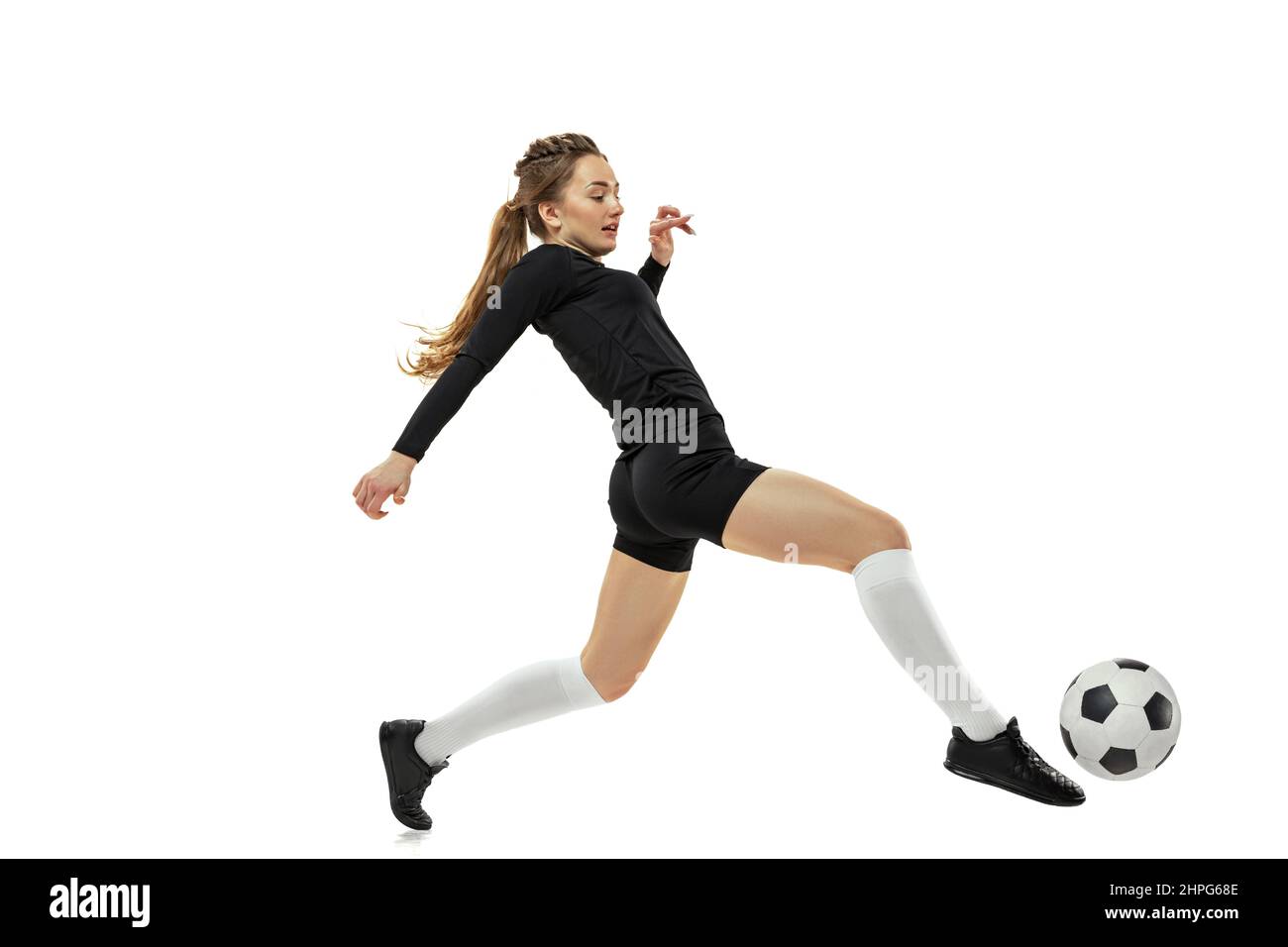 Workout. One sportive girl, female soccer player practicing with ...