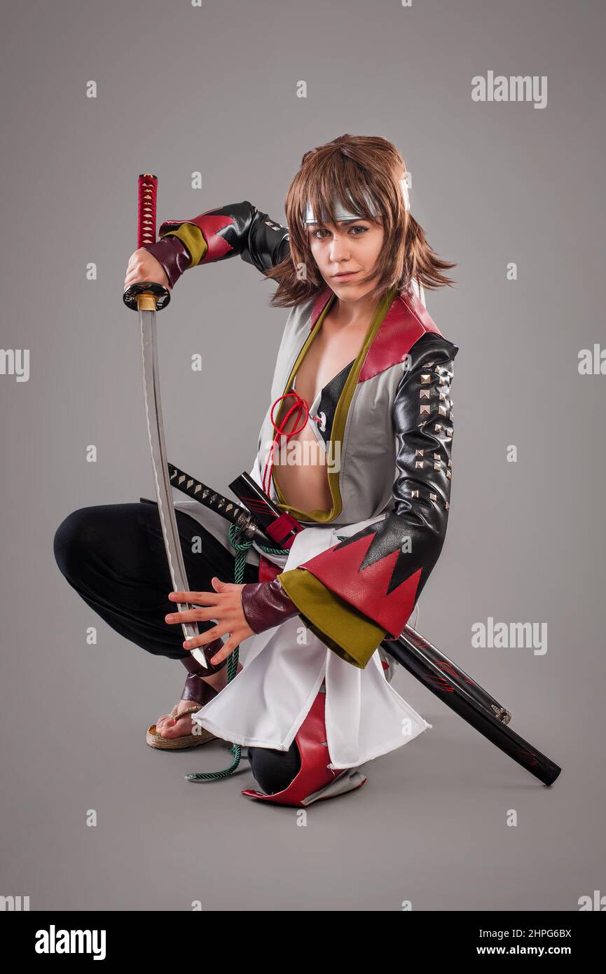 Japanese samurai with katana sword. Studio shoot. Isolated Stock Photo ...