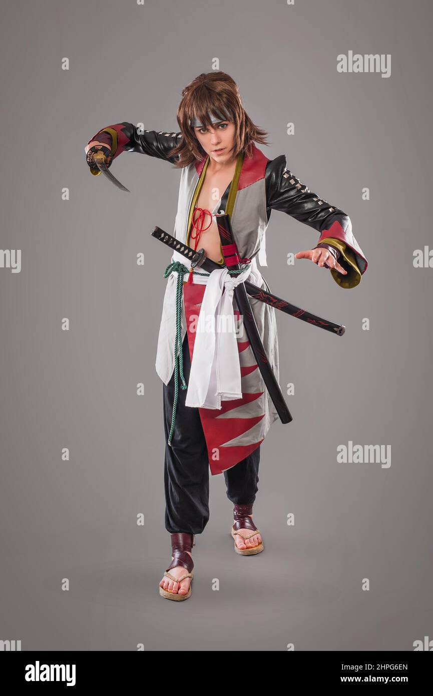 Japanese samurai with katana sword. Studio shoot. Isolated Stock Photo ...