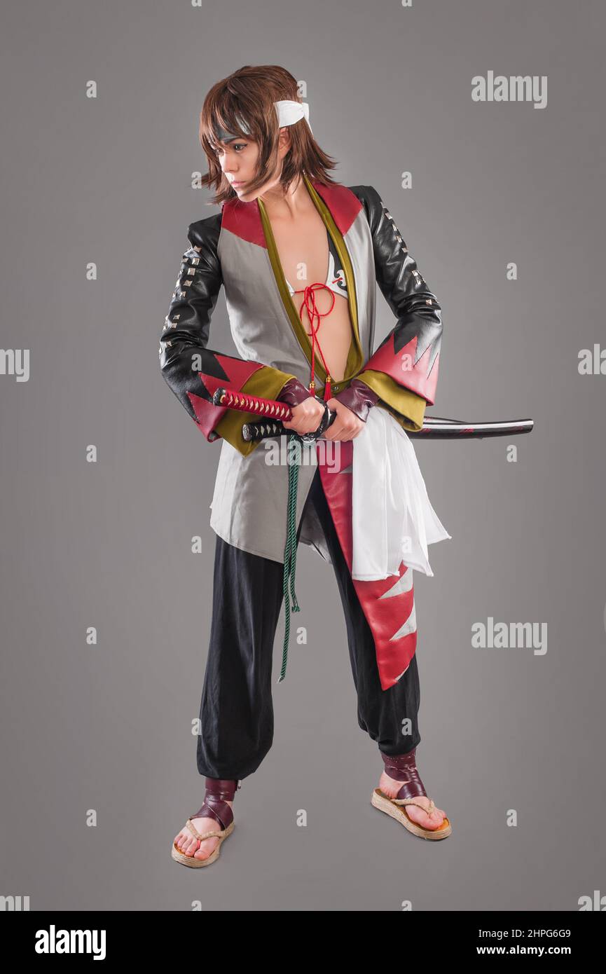 Japanese samurai with katana sword. Studio shoot. Isolated Stock Photo ...