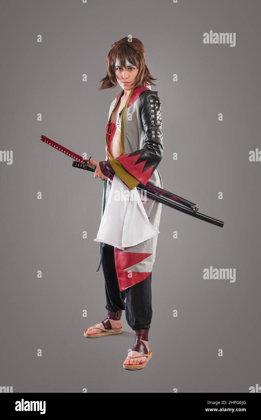 Japanese samurai with katana sword. Studio shoot. Isolated Stock Photo ...
