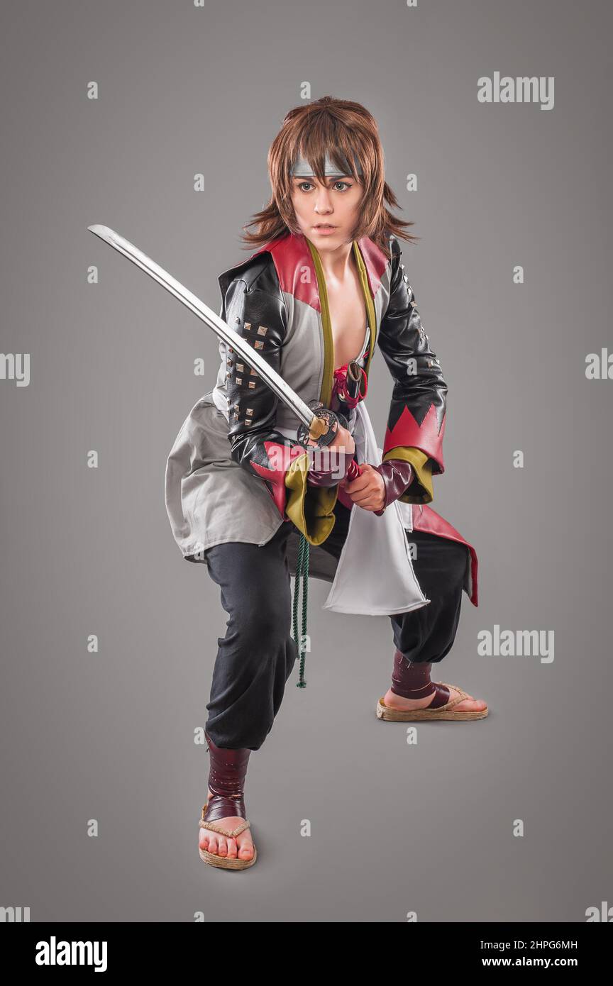 Japanese samurai with katana sword. Studio shoot. Isolated Stock Photo ...