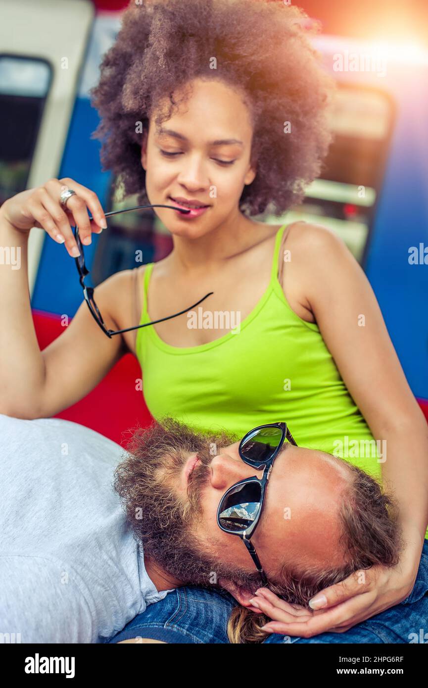 Young couple sleeping on bench hi-res stock photography and images - Alamy