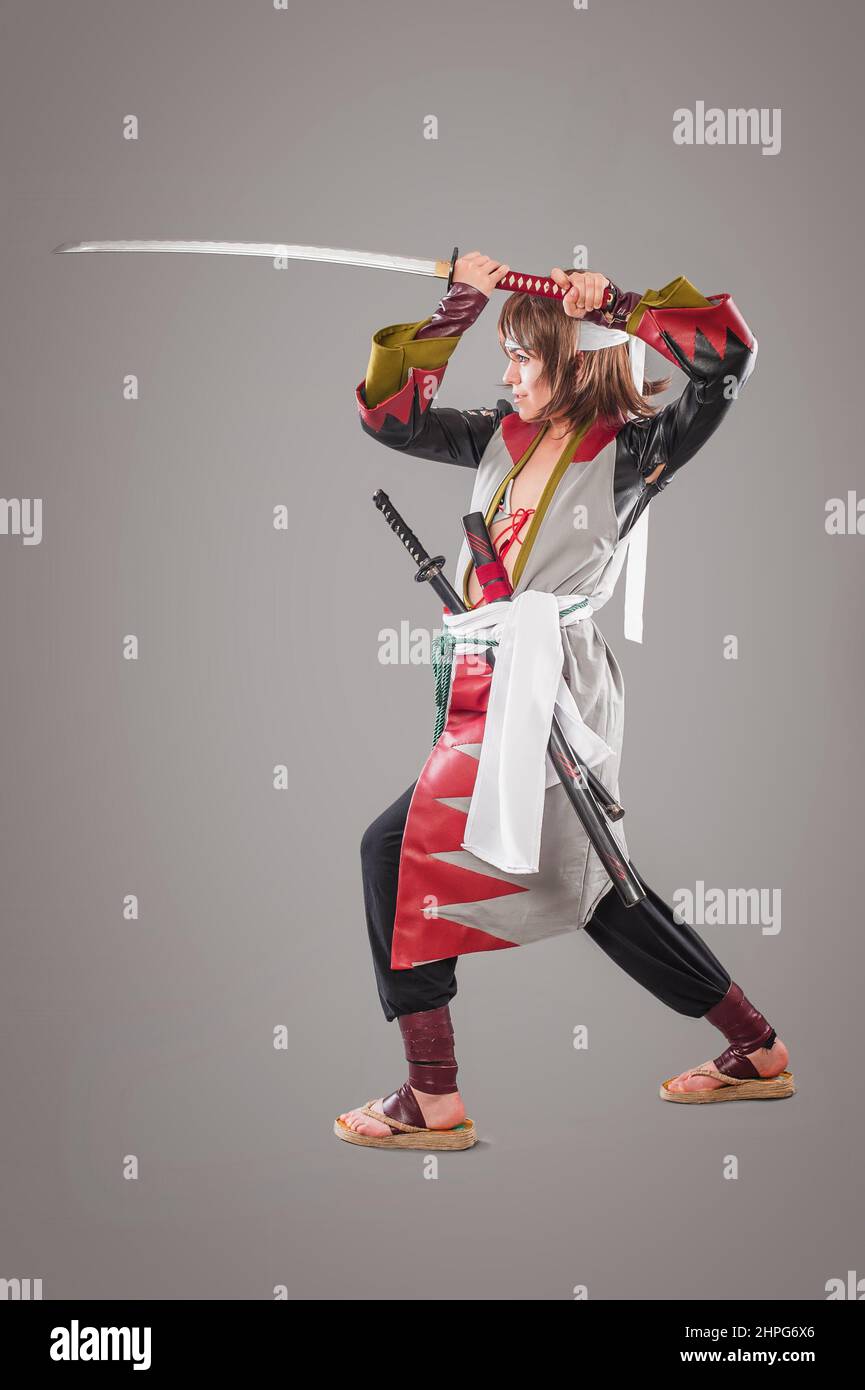 Japanese samurai with katana sword. Studio shoot. Isolated Stock Photo ...