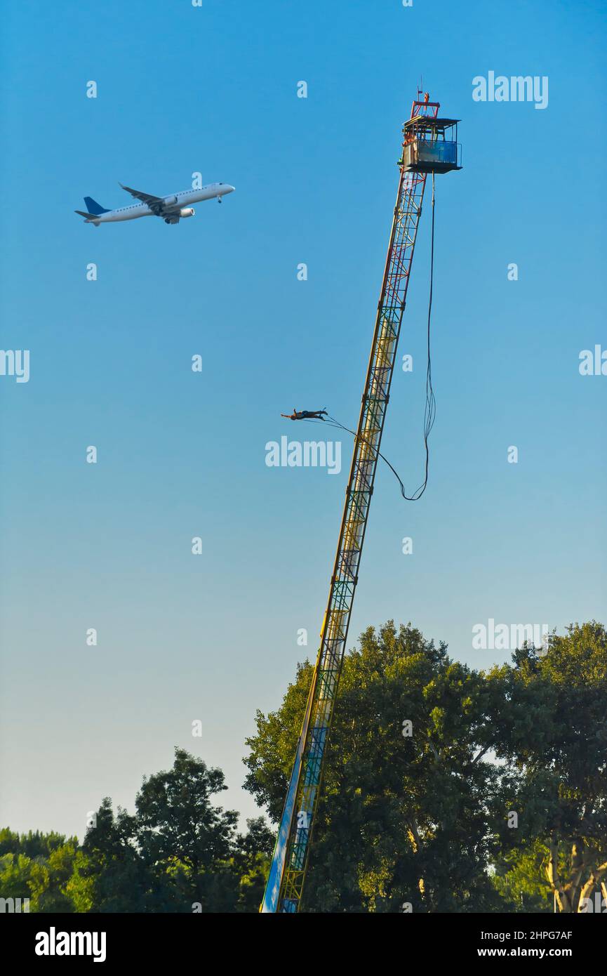 Rope jumping or bungee jumping, man jumping to the bottom. Bungee ...