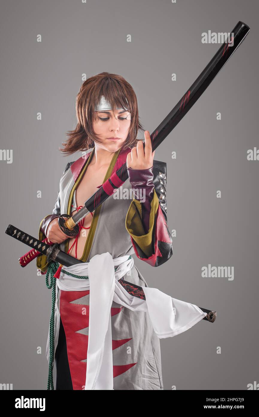 Japanese samurai with katana sword. Studio shoot. Isolated Stock Photo ...