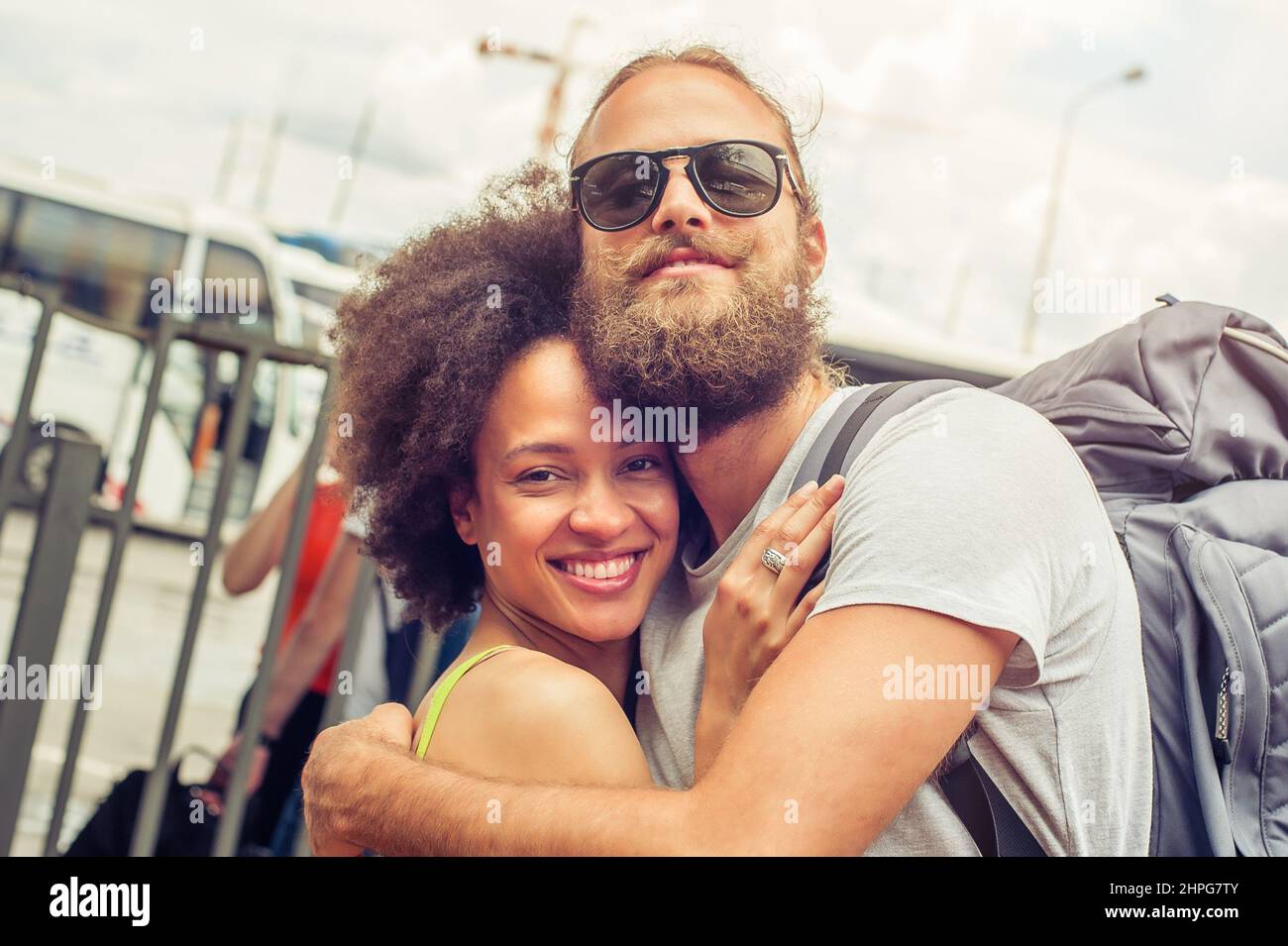 Close up of romantic couple in love at the bus station Stock Photo - Alamy