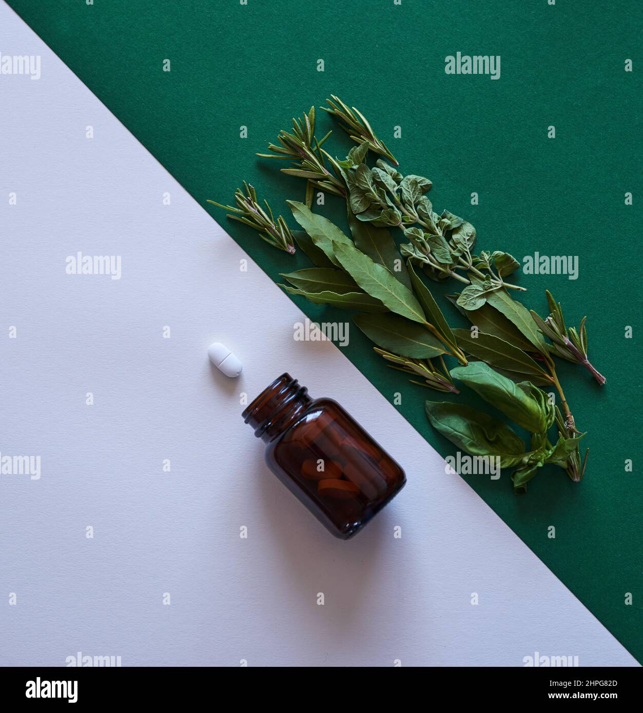 Herbal versus chemical medicine - alternative remedies flat lay ...