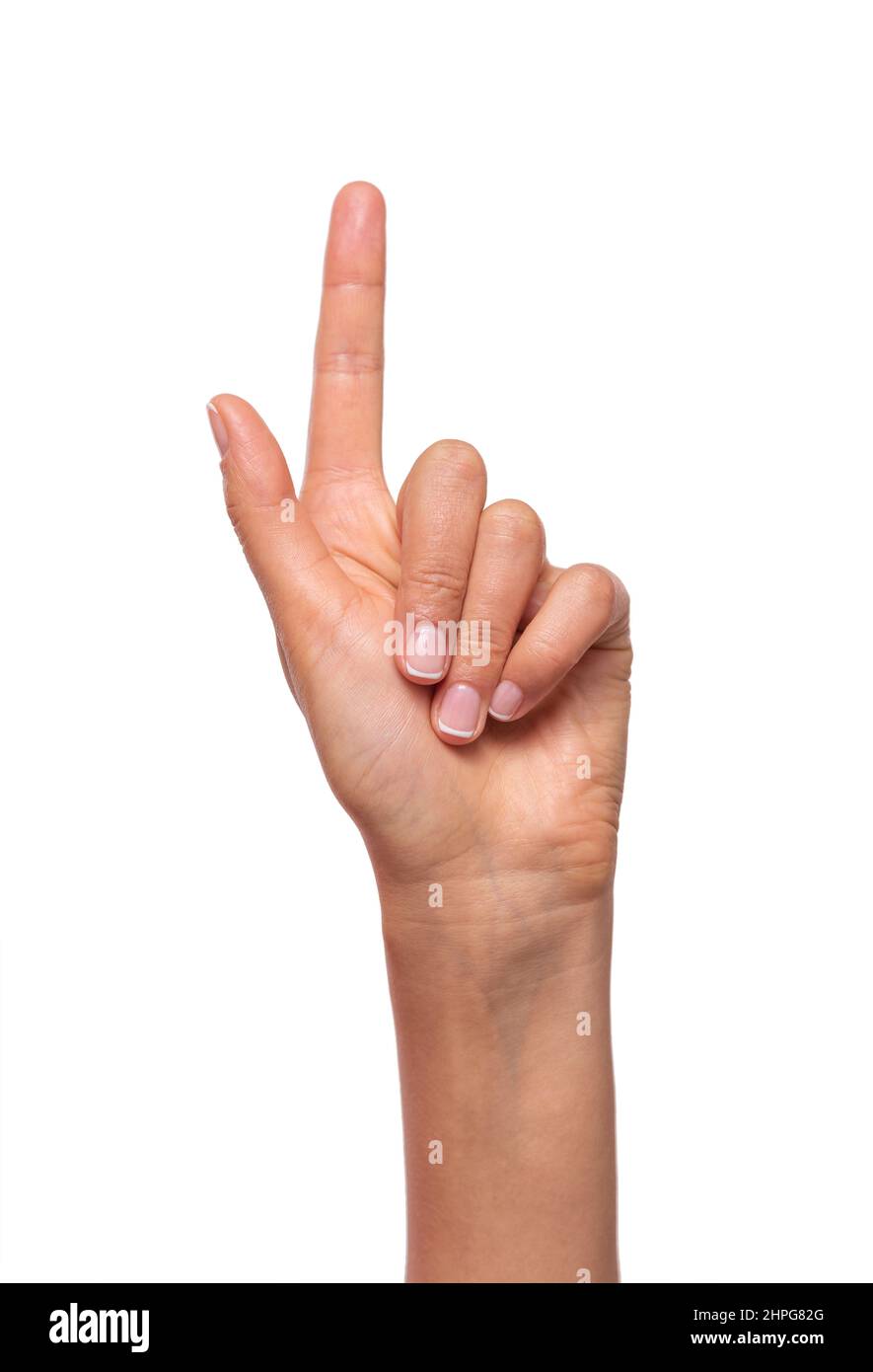 Woman pointing at something on white Stock Photo - Alamy