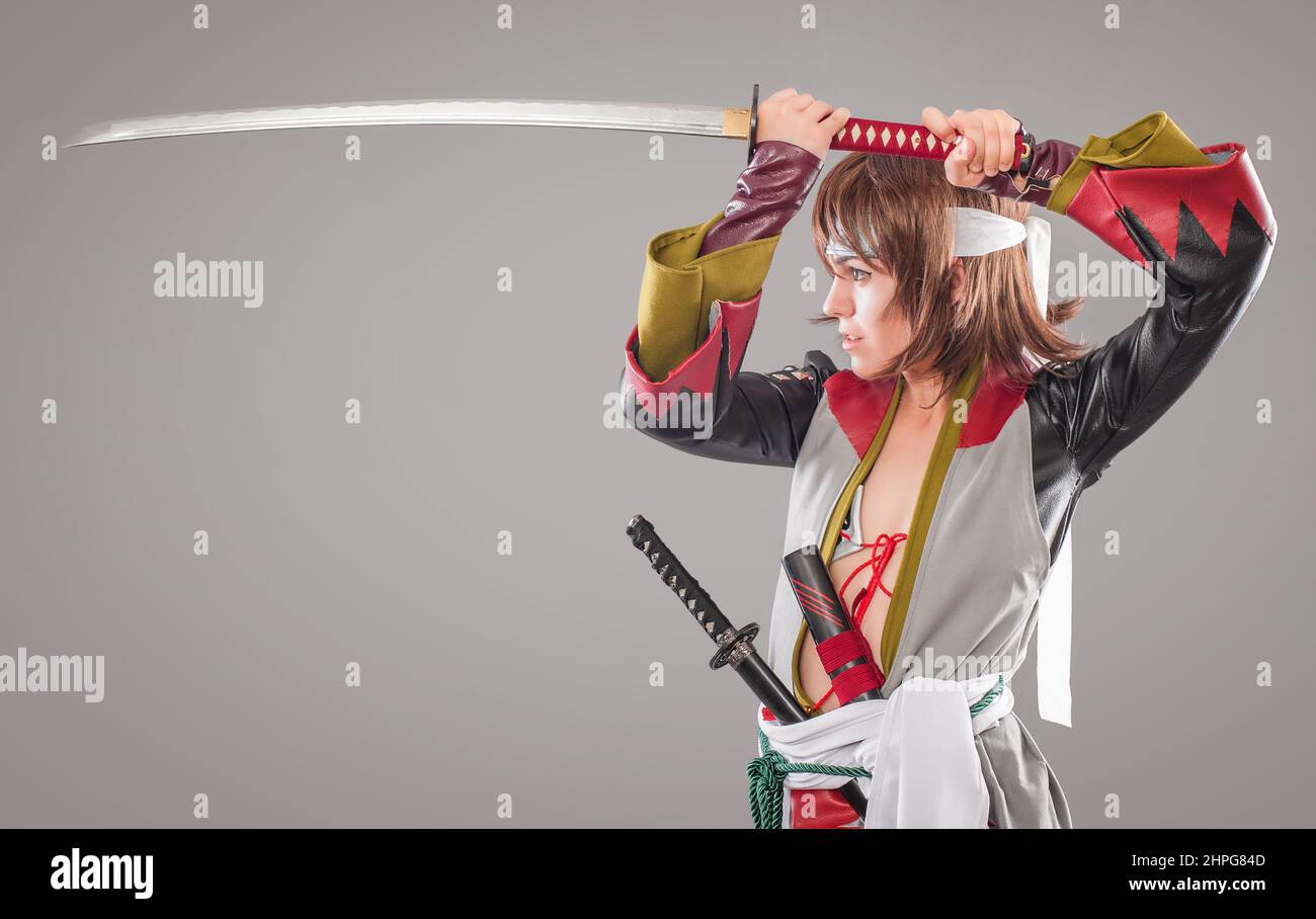 Japanese samurai with katana sword. Studio shoot. Isolated Stock Photo ...