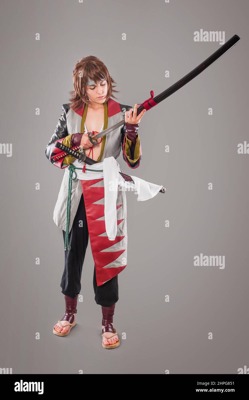 Japanese samurai with katana sword. Studio shoot. Isolated Stock Photo ...