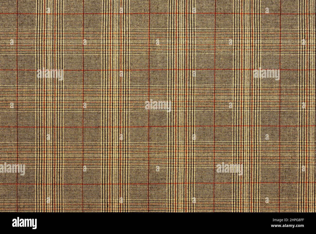 Checkered fabric in yellow or brown. Background from checkered fabric ...