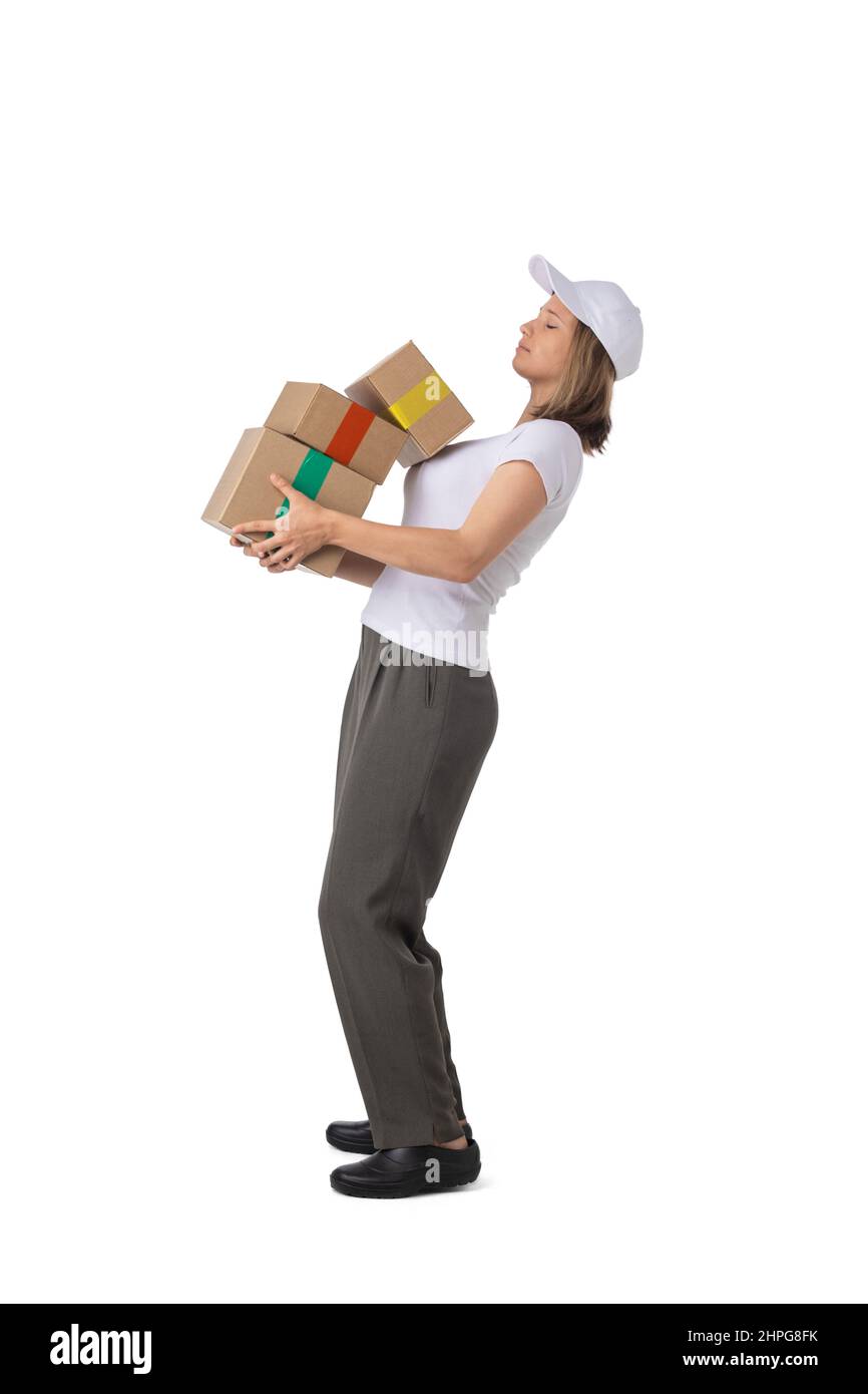 Full length portrait of delivery woman in white cap, t-shirt giving ...