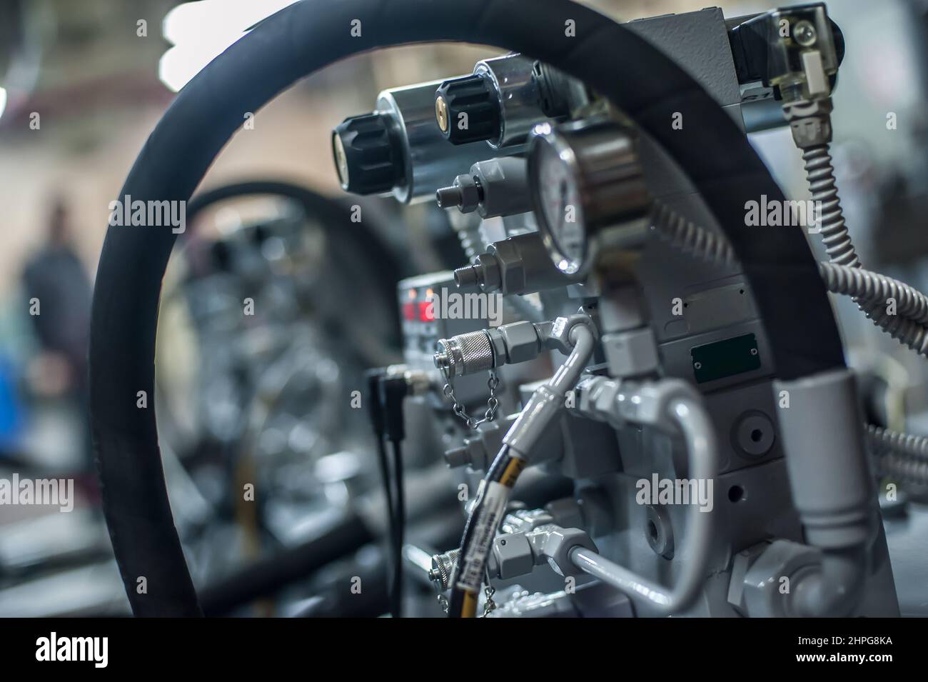 Mechanic automatic pump working at the factory. Industrial interior and ...