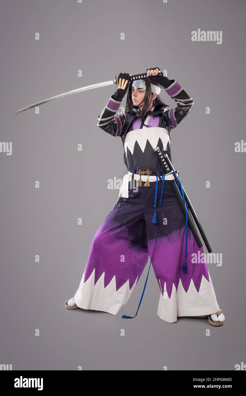 Japanese samurai with katana sword. Studio shoot. Isolated Stock Photo ...