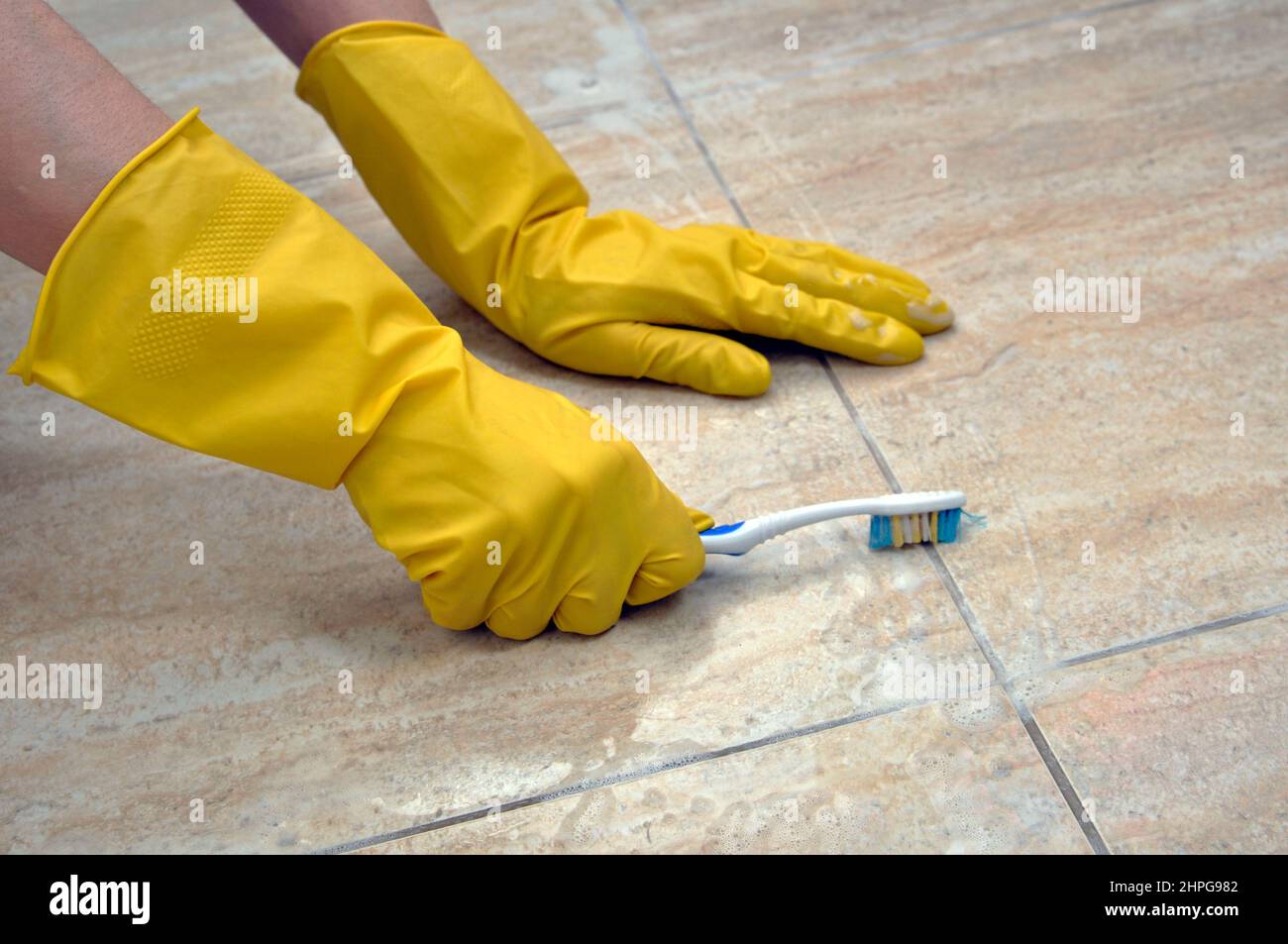 Cleaning tile joints hi-res stock photography and images - Alamy