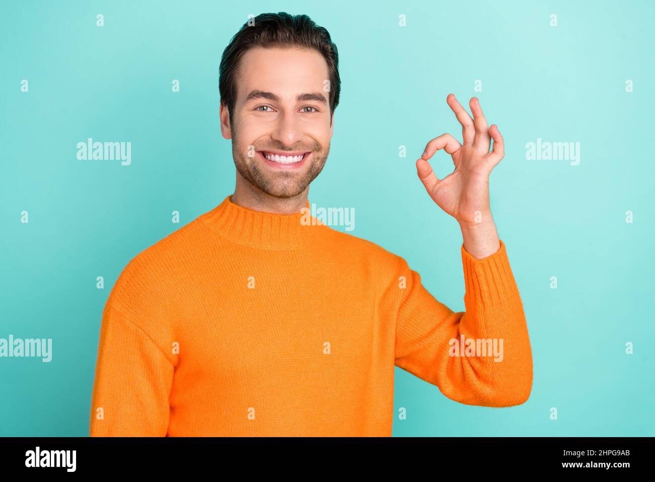 Photo of young man show fingers okey symbol promo perfect good advert ...