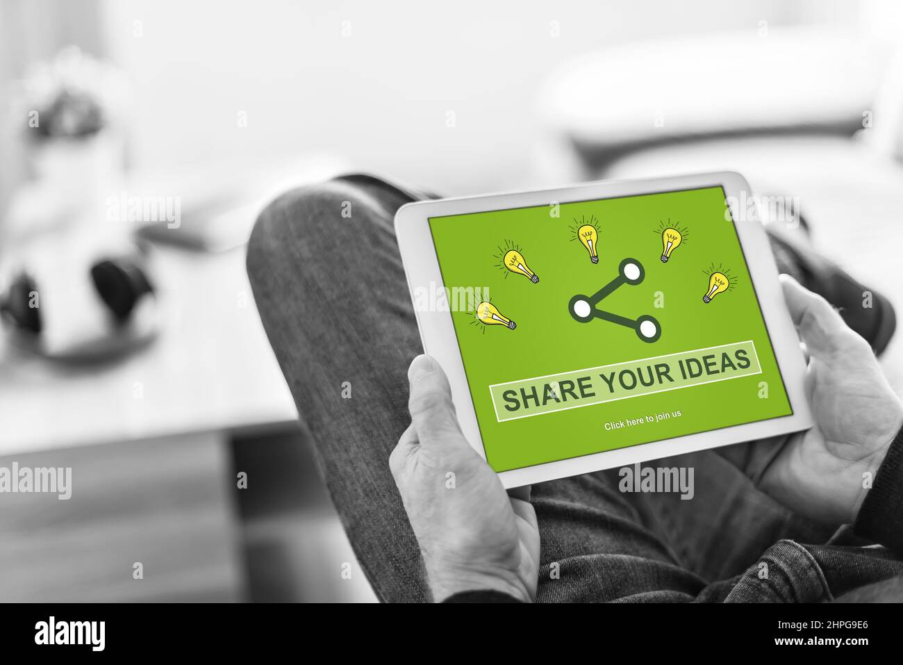 Tablet screen displaying an ideas sharing concept Stock Photo - Alamy