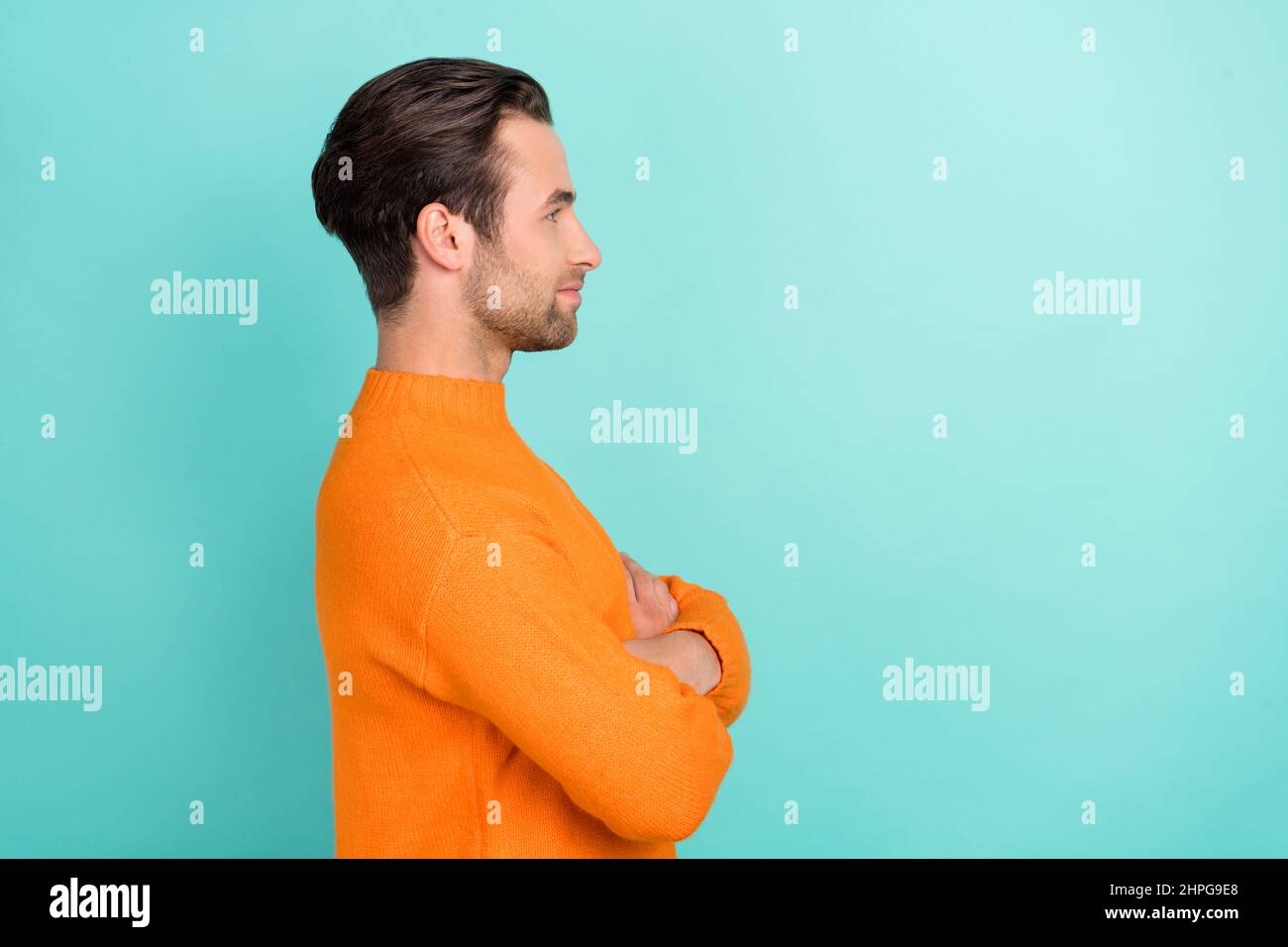 Profile side photo of young man crossed hands look empty space smart ...