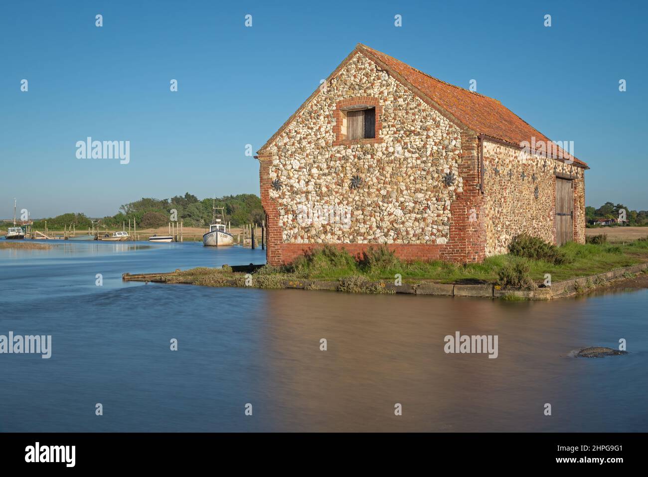 The Coal Barn at Thornham Old Harbour being surrounded by flood waters ...