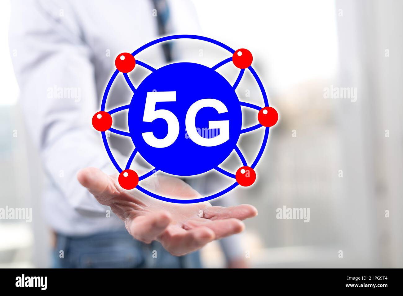 5g concept above the hand of a man in background Stock Photo - Alamy