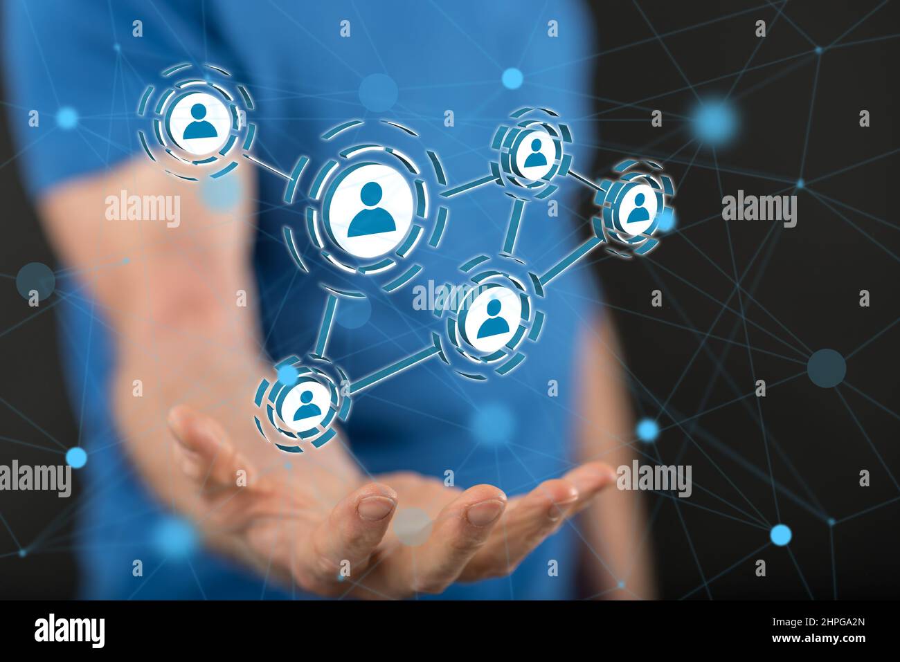 Social media and teamwork concept above the hand of a man in background ...