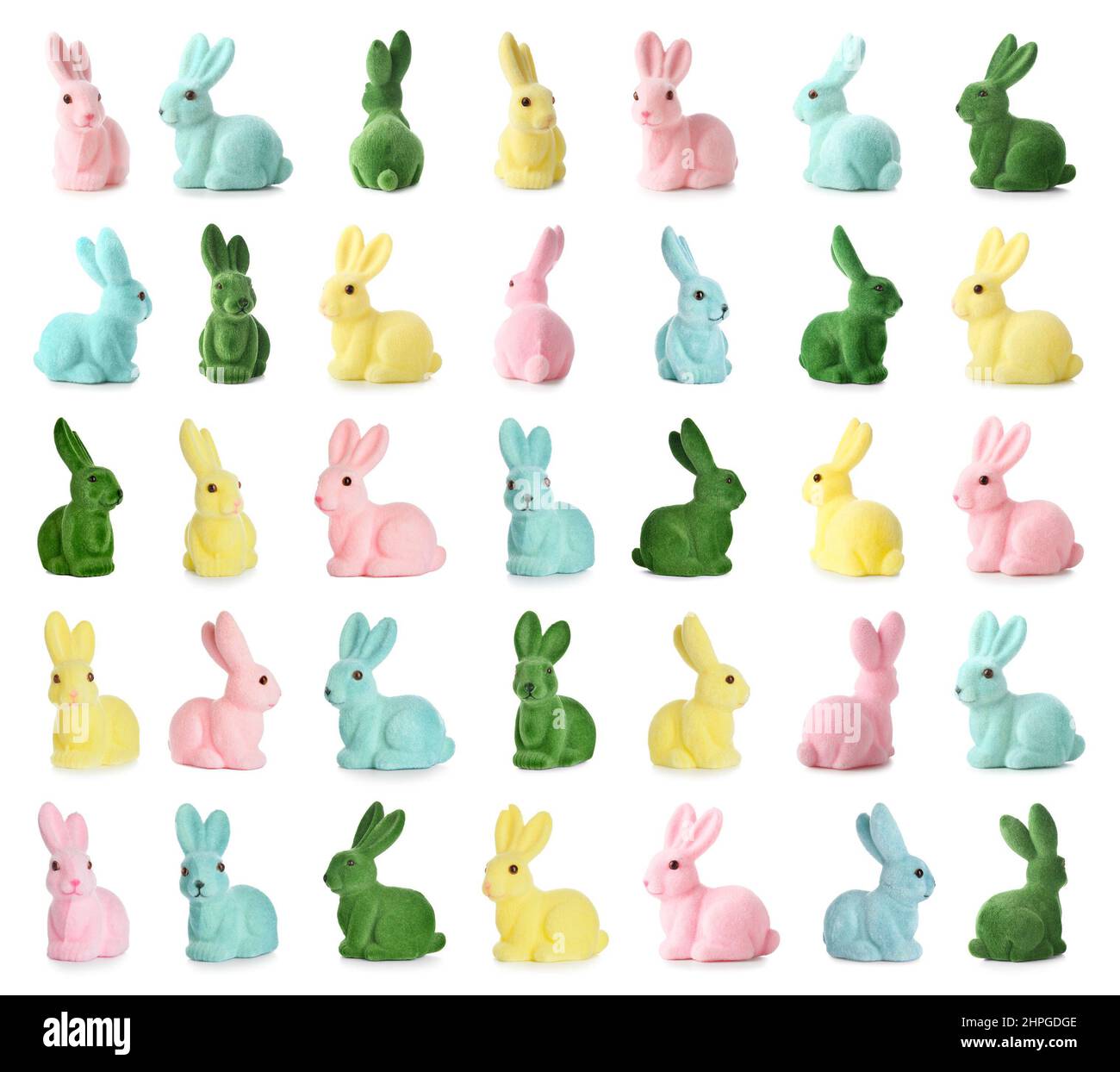 Different Easter bunnies on white background Stock Photo - Alamy