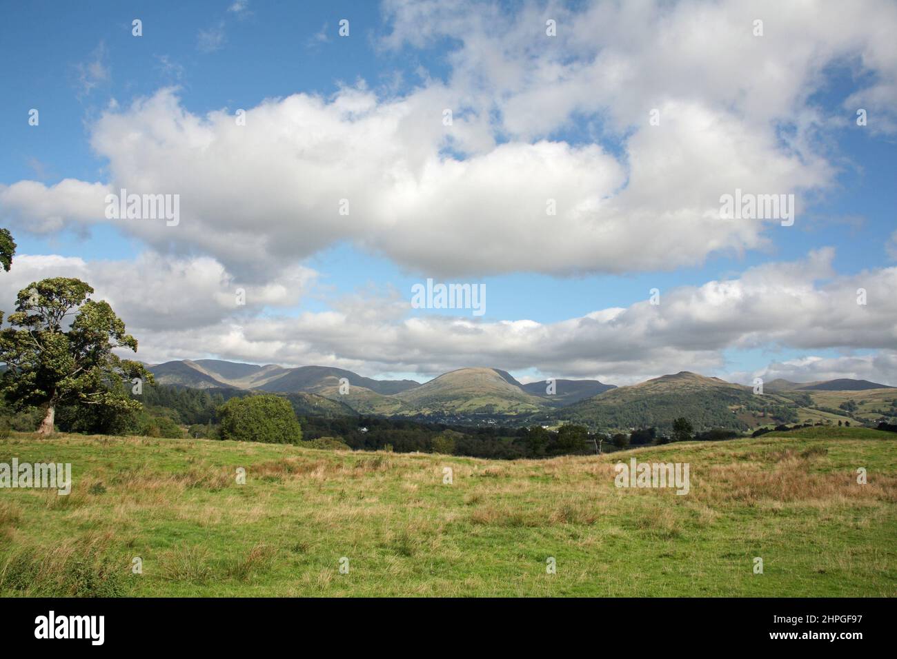 The fells rising above Grasmere viewed from near Hawkshead The Lake ...