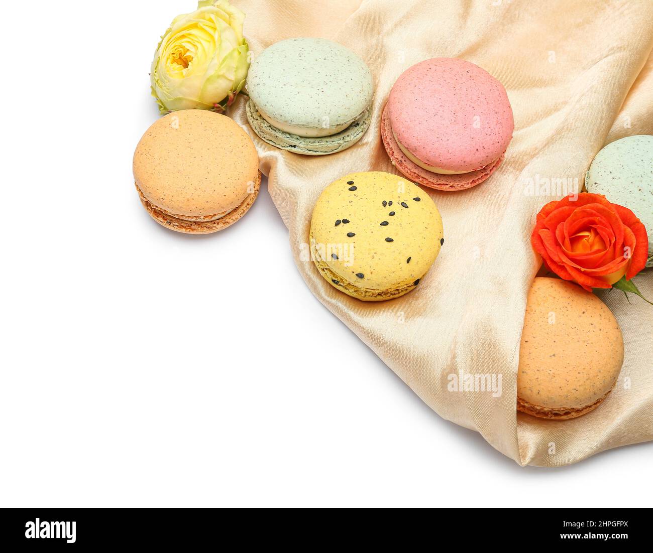 Sweet macaroons and rose flowers isolated on white background Stock ...