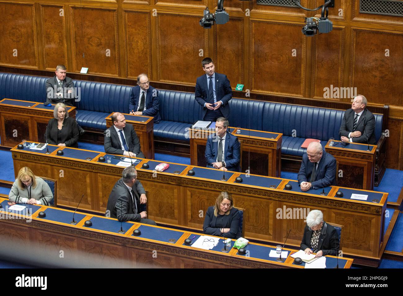 DUP MLA Jonathan Buckley (back row, second from right) speaking in the ...