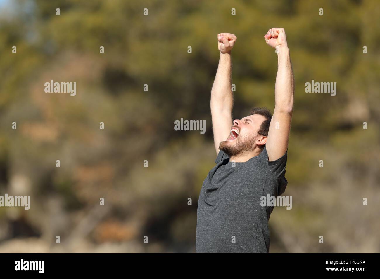 Man raising their arms in the air hi-res stock photography and images ...