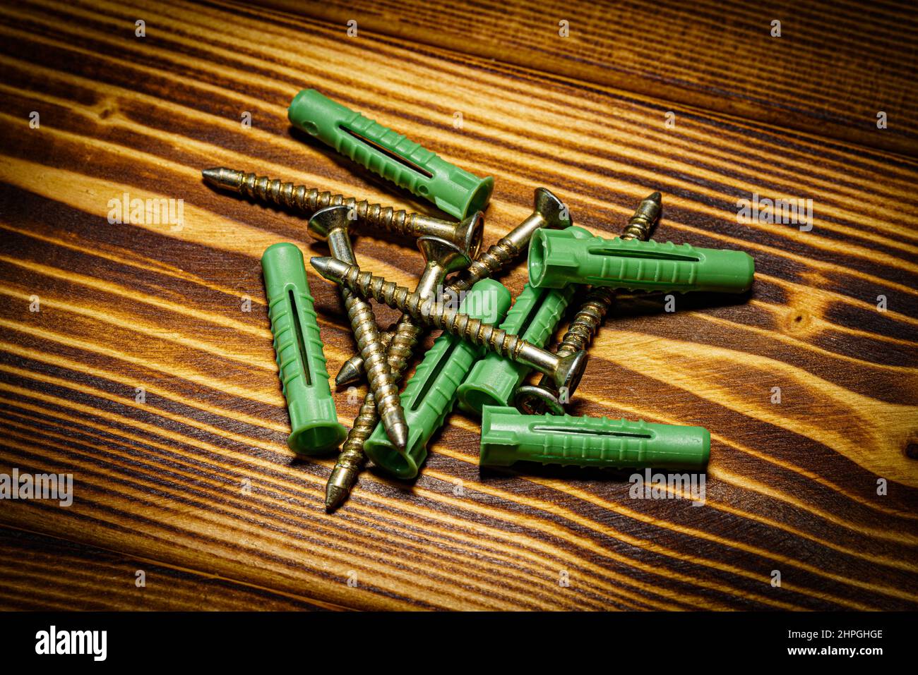 metal screw on wooden top table Stock Photo - Alamy
