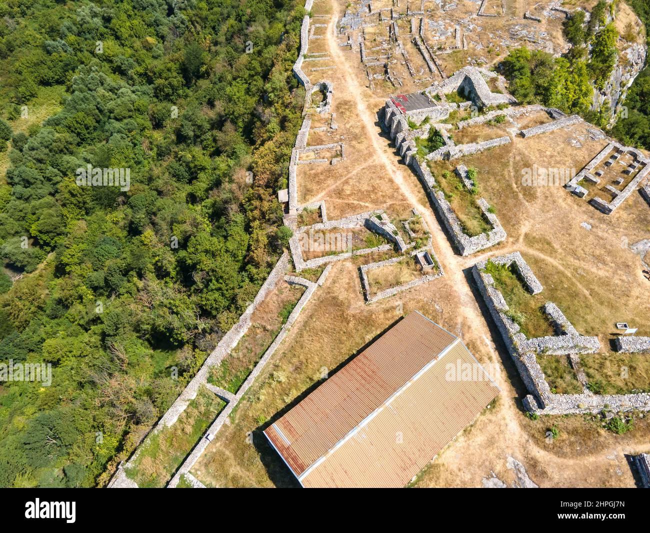 Aerial view of Ruins of medieval fortificated city of Cherven from ...