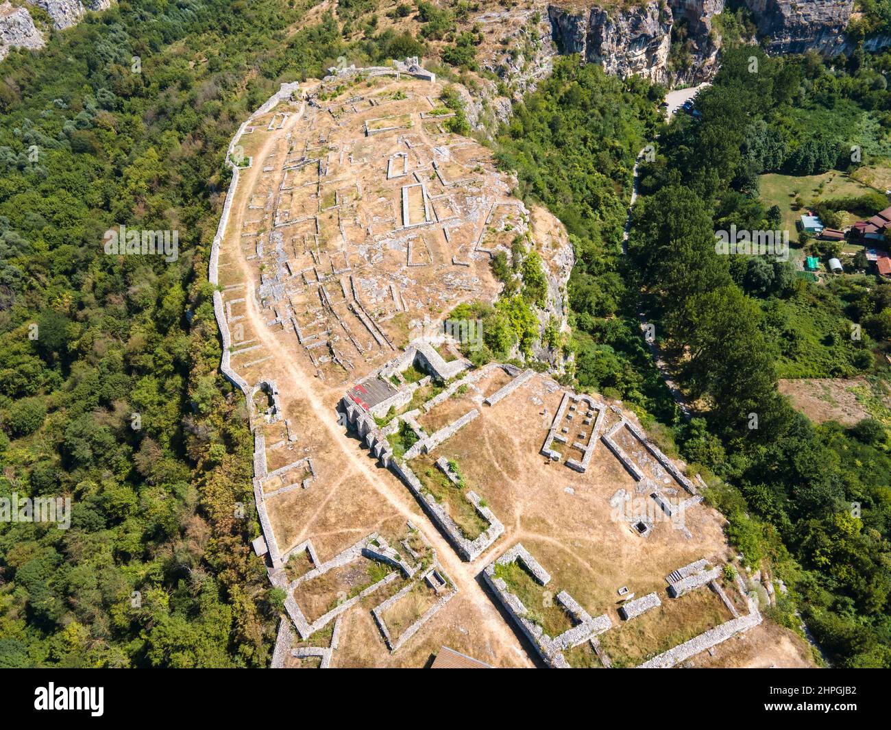 Aerial view of Ruins of medieval fortificated city of Cherven from ...