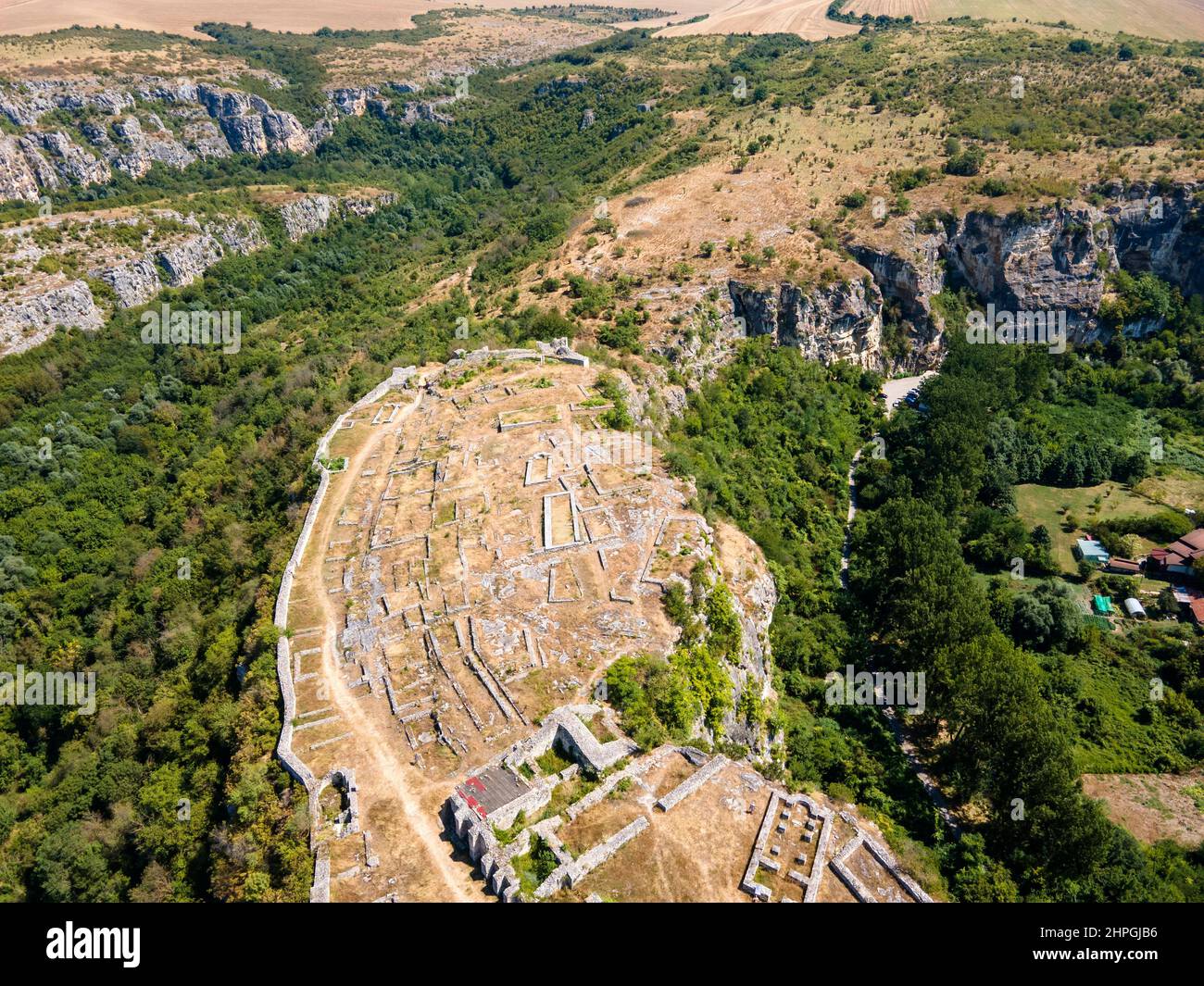 Aerial view of Ruins of medieval fortificated city of Cherven from ...
