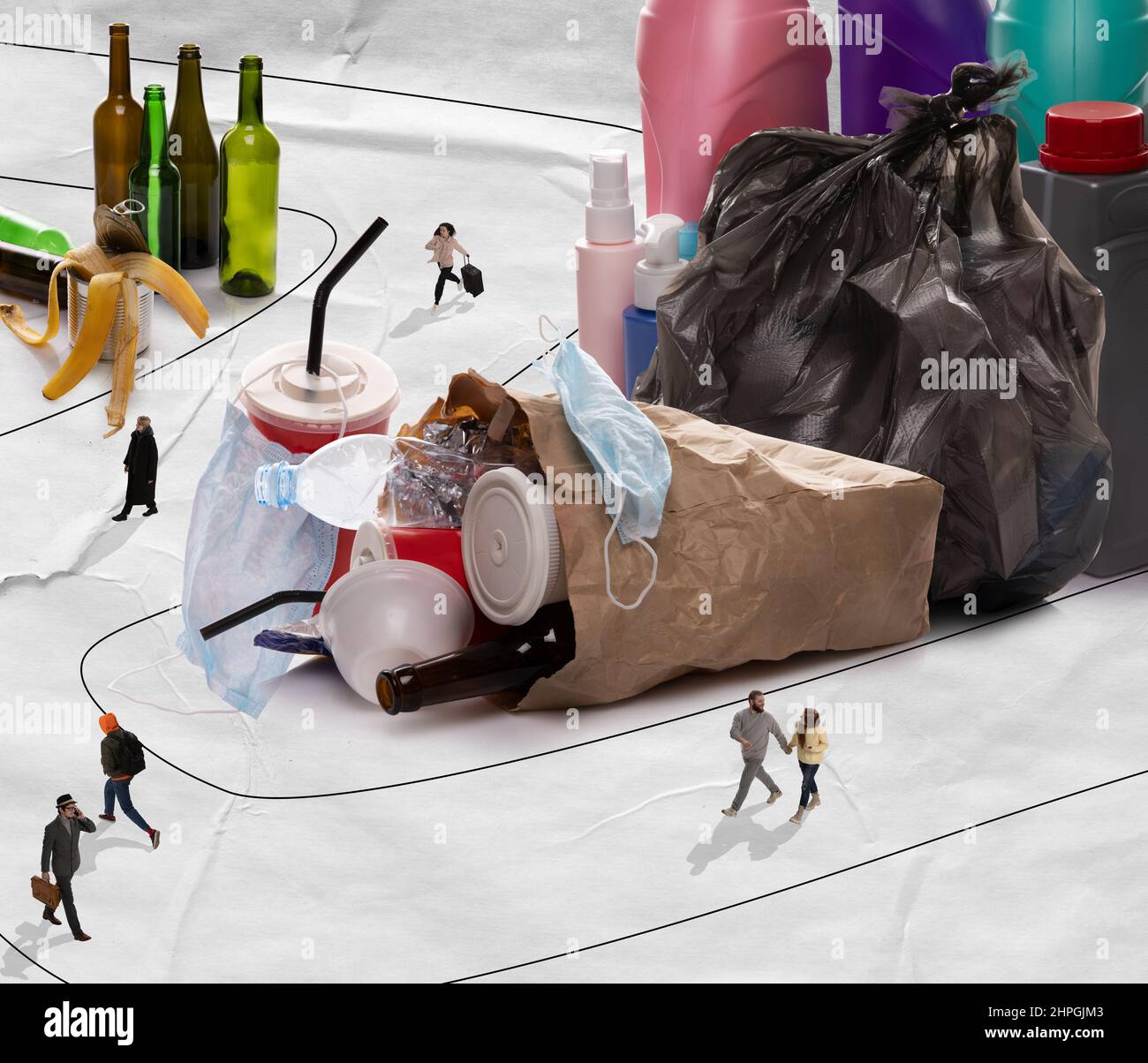 Garbage-monster. Tiny men and women in city made of rubbish, plastic ...