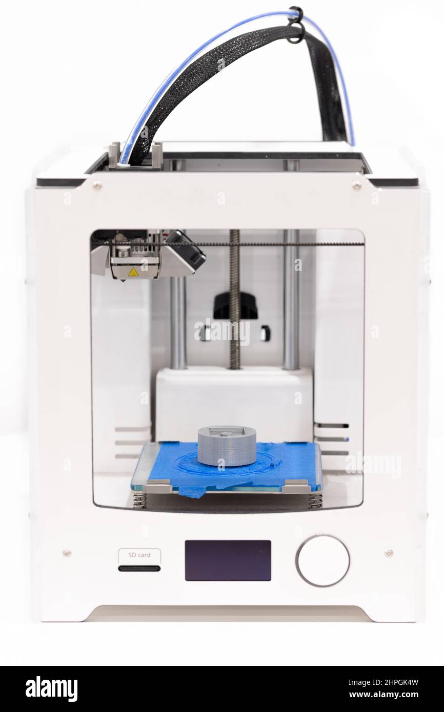 A white three dimensional printer on a white background Stock Photo - Alamy