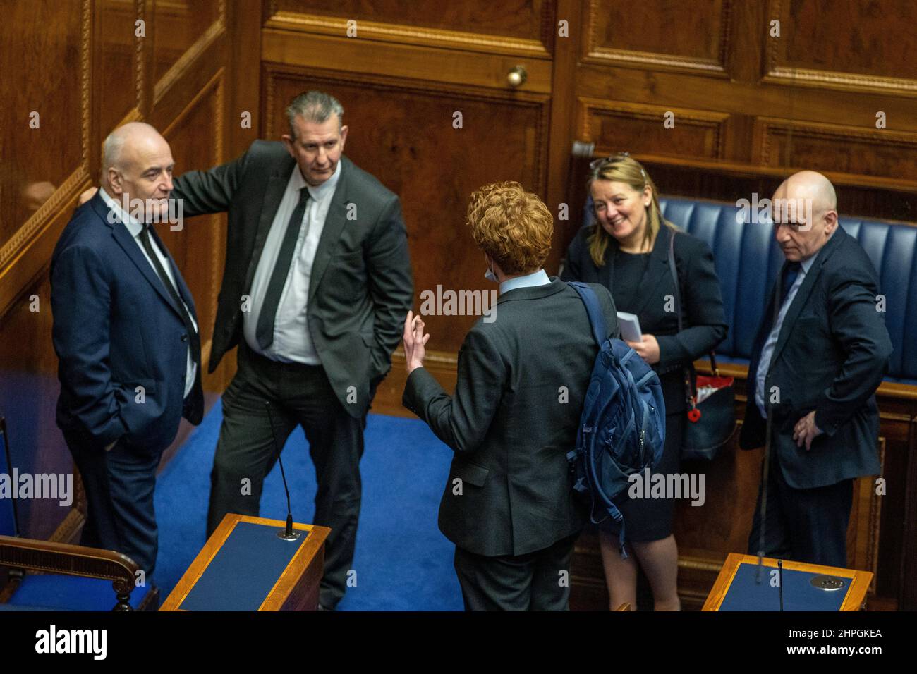 SDLP MLA Matthew O'Toole (centre) speaking with (from left) DUP MLAs ...