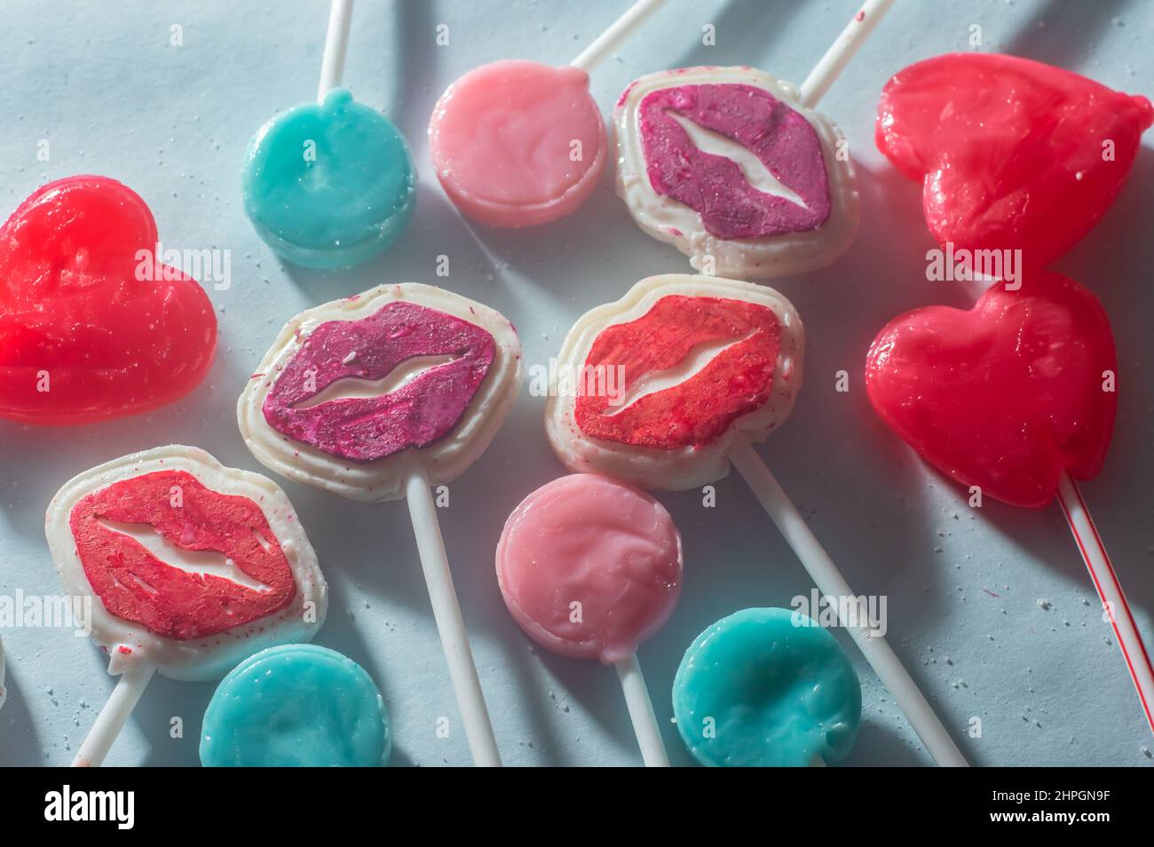 Various lollipops with light blue background,lollipop texture for ...