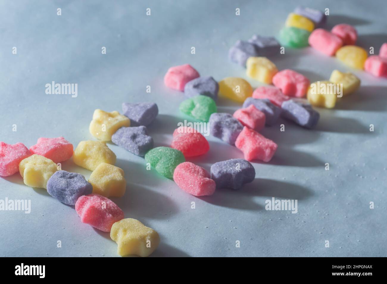 Colorful sweets varied with the word "Peace" written,light blue ...