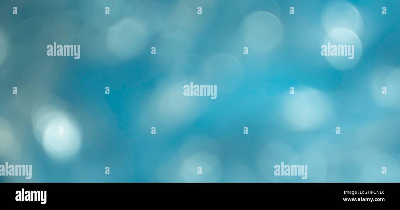 Abstract blur blue bokeh background. Defocused blurred color light ...